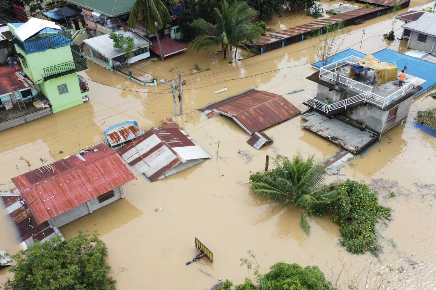 Floods Hit Northern Philippines After Typhoon Forces Dam Release The