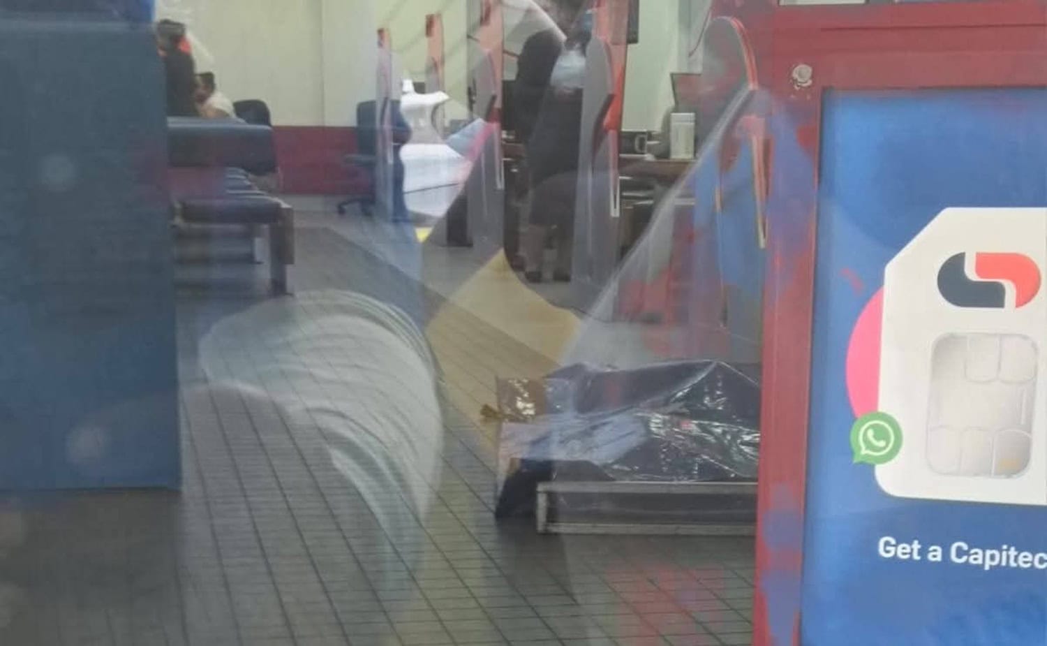 WATCH | Two arrested after body brought into bank over funeral claim ...
